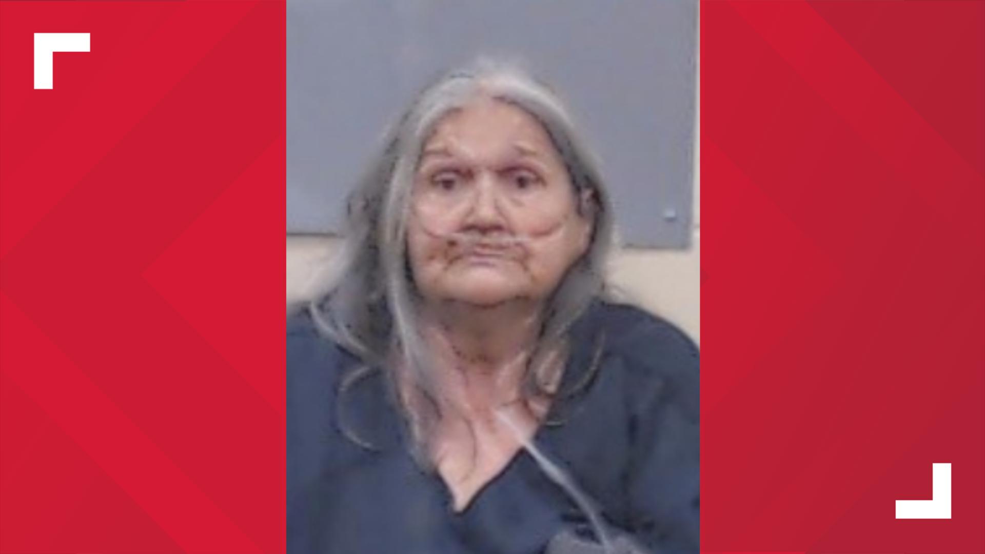 Woman accused of pinning a security guard between cars during incident ...
